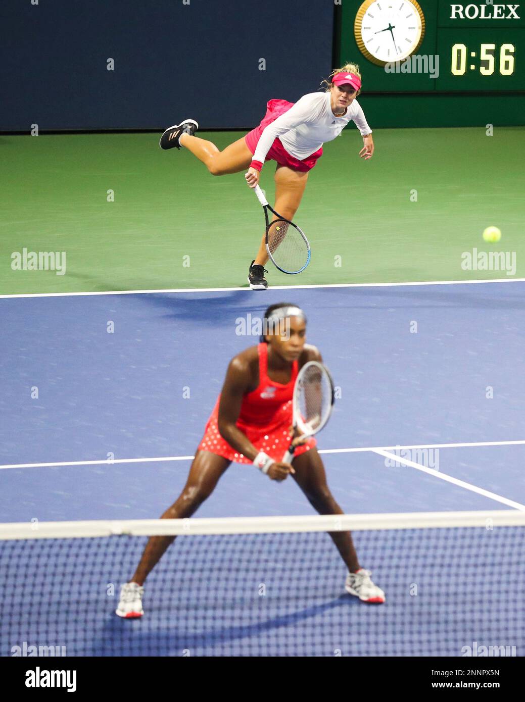 Cori Gauff and Catherine McNally in action against Hailey Baptiste and ...