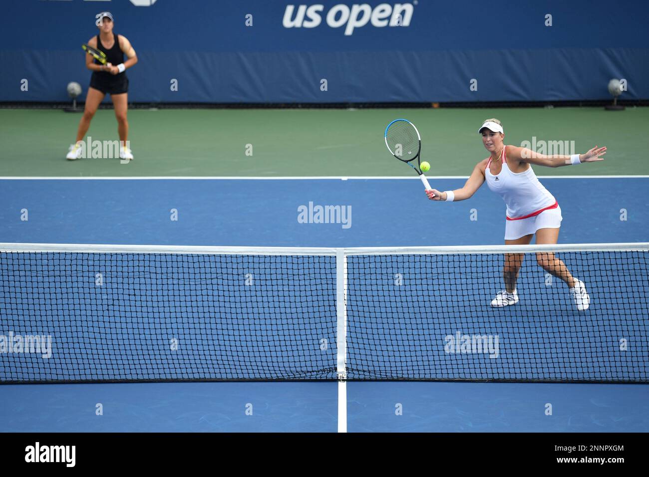 Alexa Guarachi and Desirae Krawczyk in action against Laura Siegemund ...