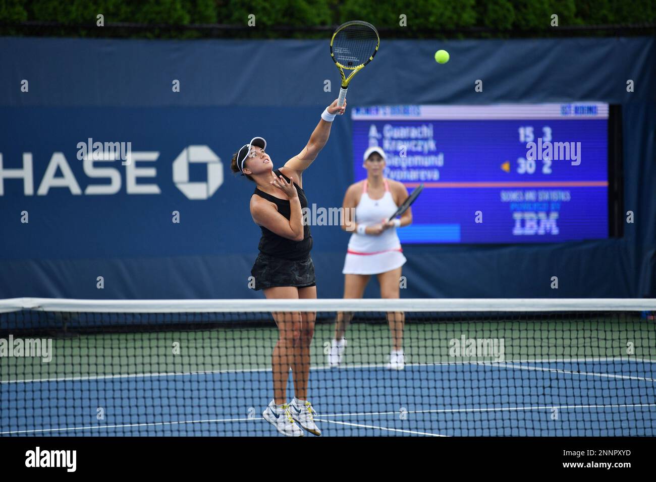 Alexa Guarachi and Desirae Krawczyk in action against Laura Siegemund ...