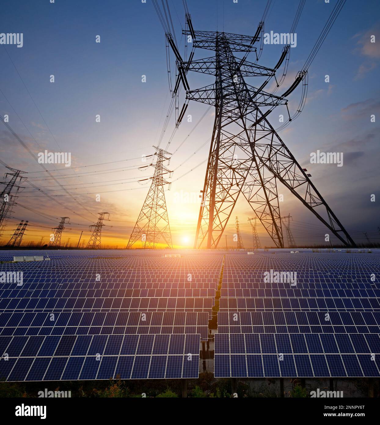 Solar panels and pylon, green environmental protection Stock Photo - Alamy