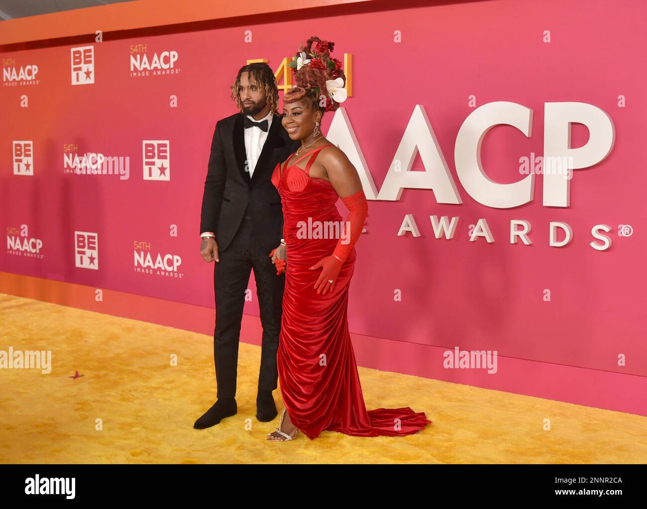 Derrick Hayes, left, and Pinky Cole arrive at the 54th NAACP Image ...