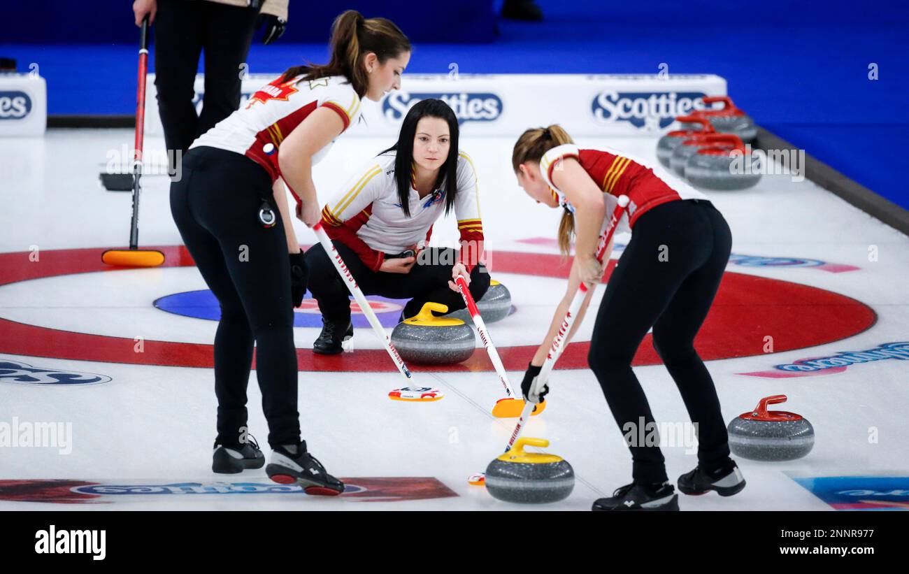 Team Canada skip Kerri Einarson, centre, directs her team against Team ...