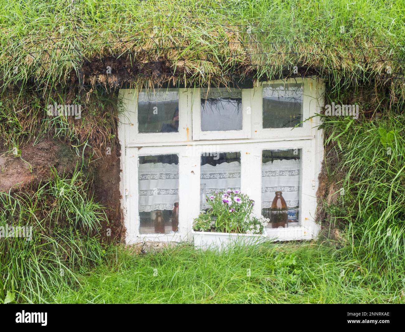 Window, traditional wooden house protected with peat from 1899 ...