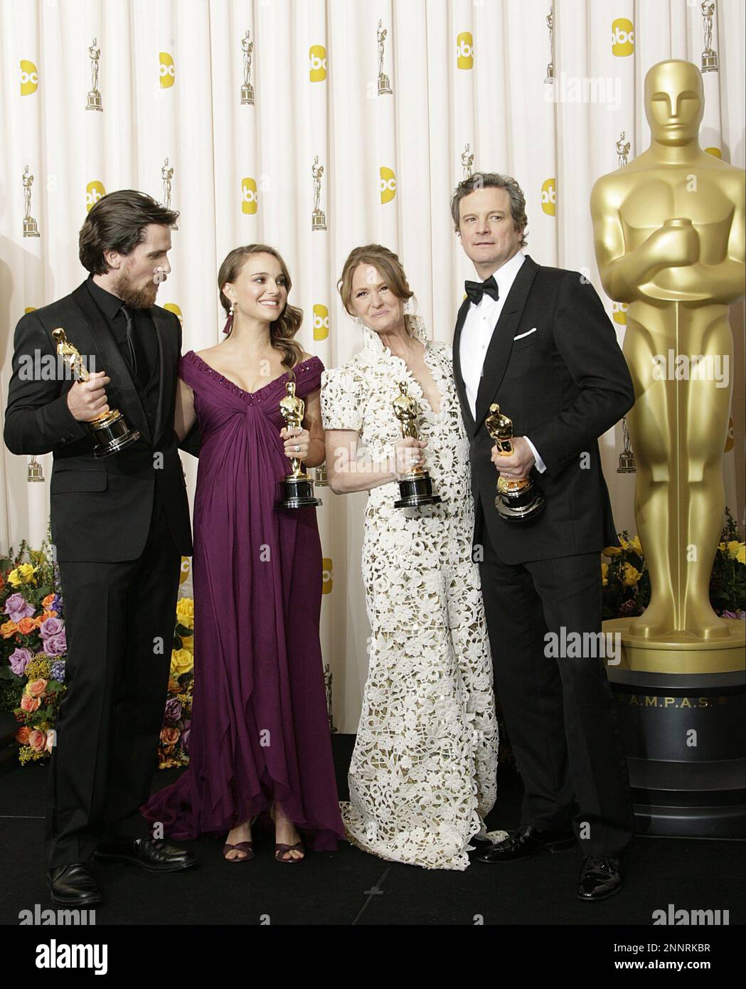 (L-R) Best Supporting Actor winner Christian Bale, Best Actress winner ...