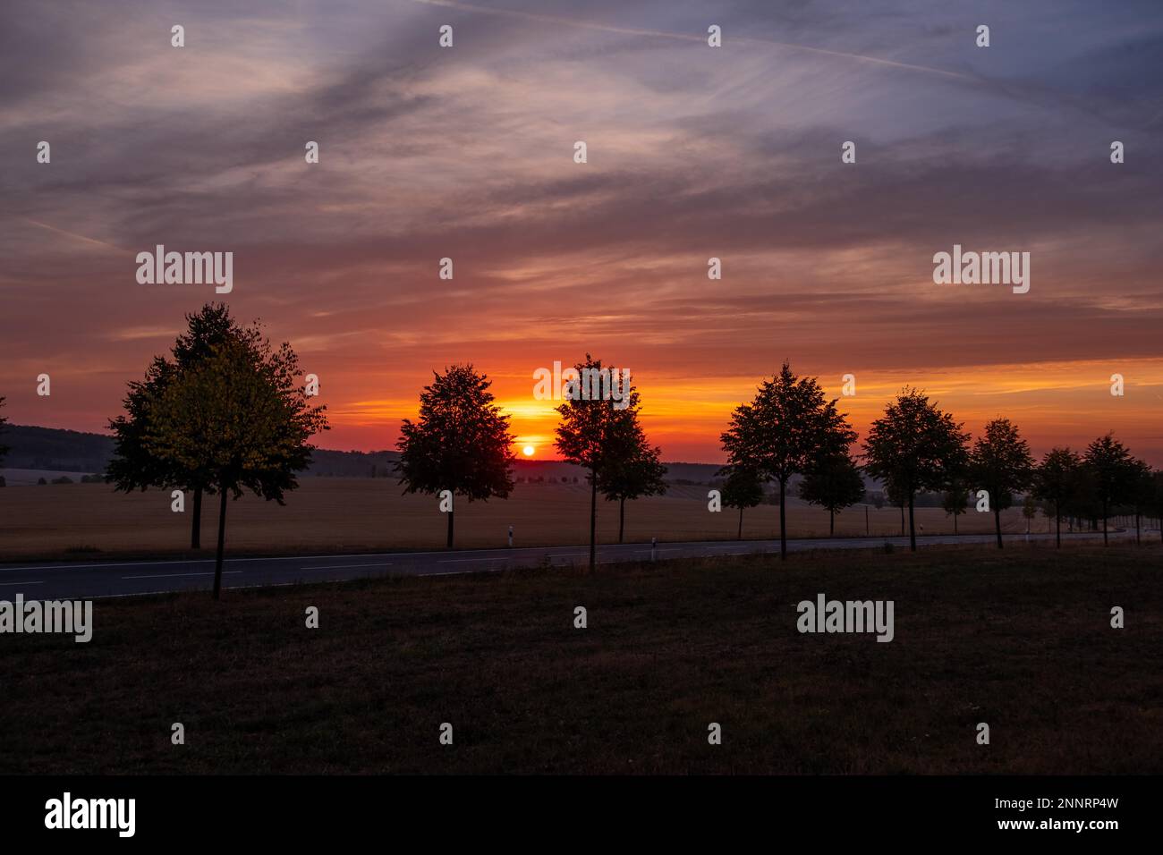 Rising sun and road hi-res stock photography and images - Alamy