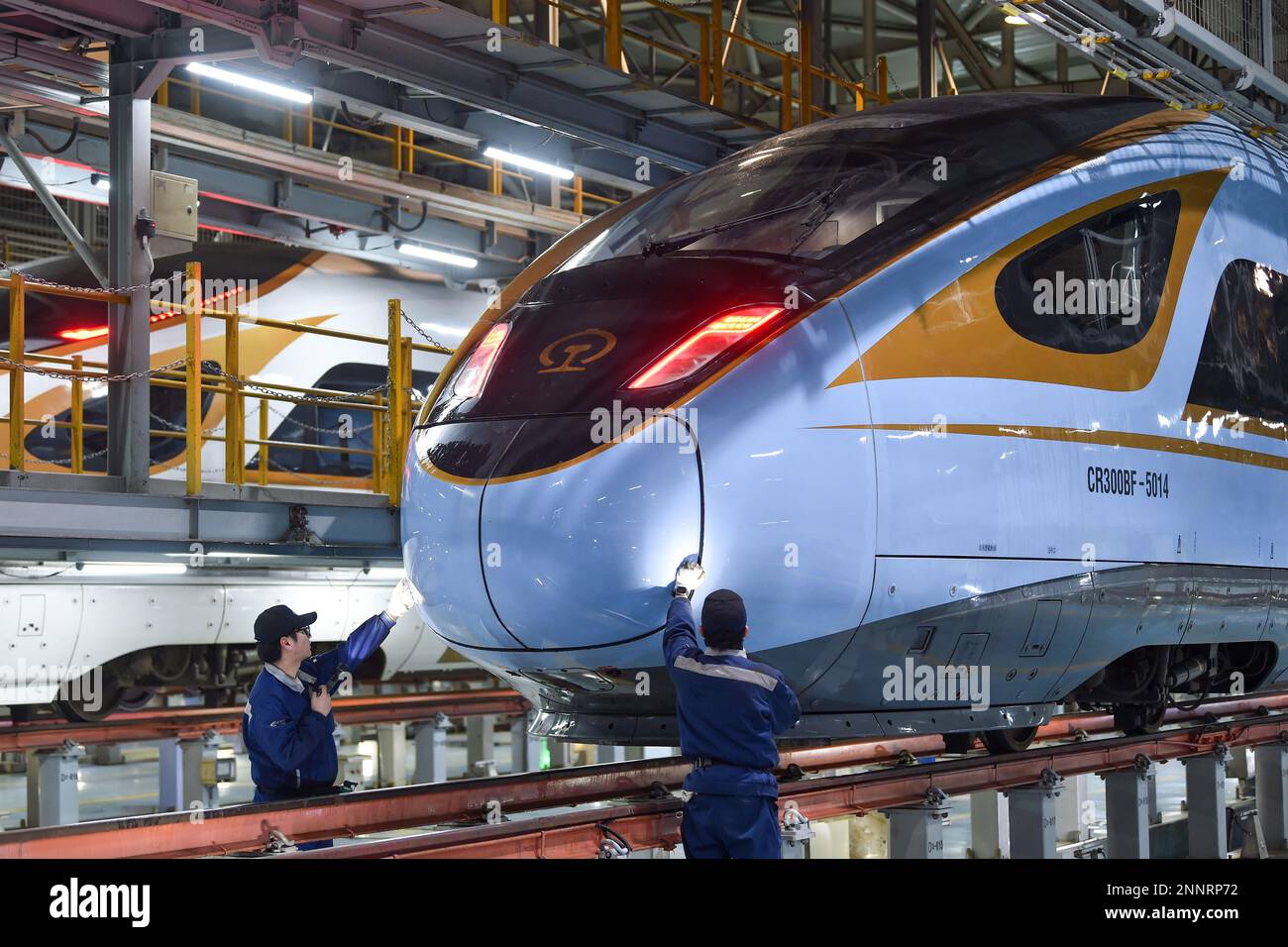 NANJING, CHIAN - FEBRUARY 26, 2023 - A ground service mechanic inspects ...