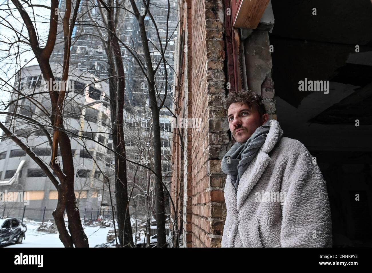 Ukrainian chef Ievgen Klopotenko poses at the entrance to his destroyed ...