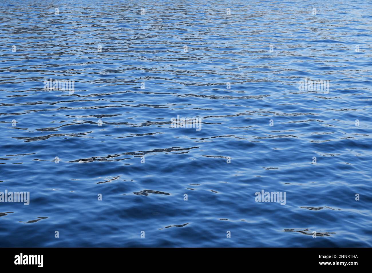 dark blue sea water background with ripples - natural ocean wave ...