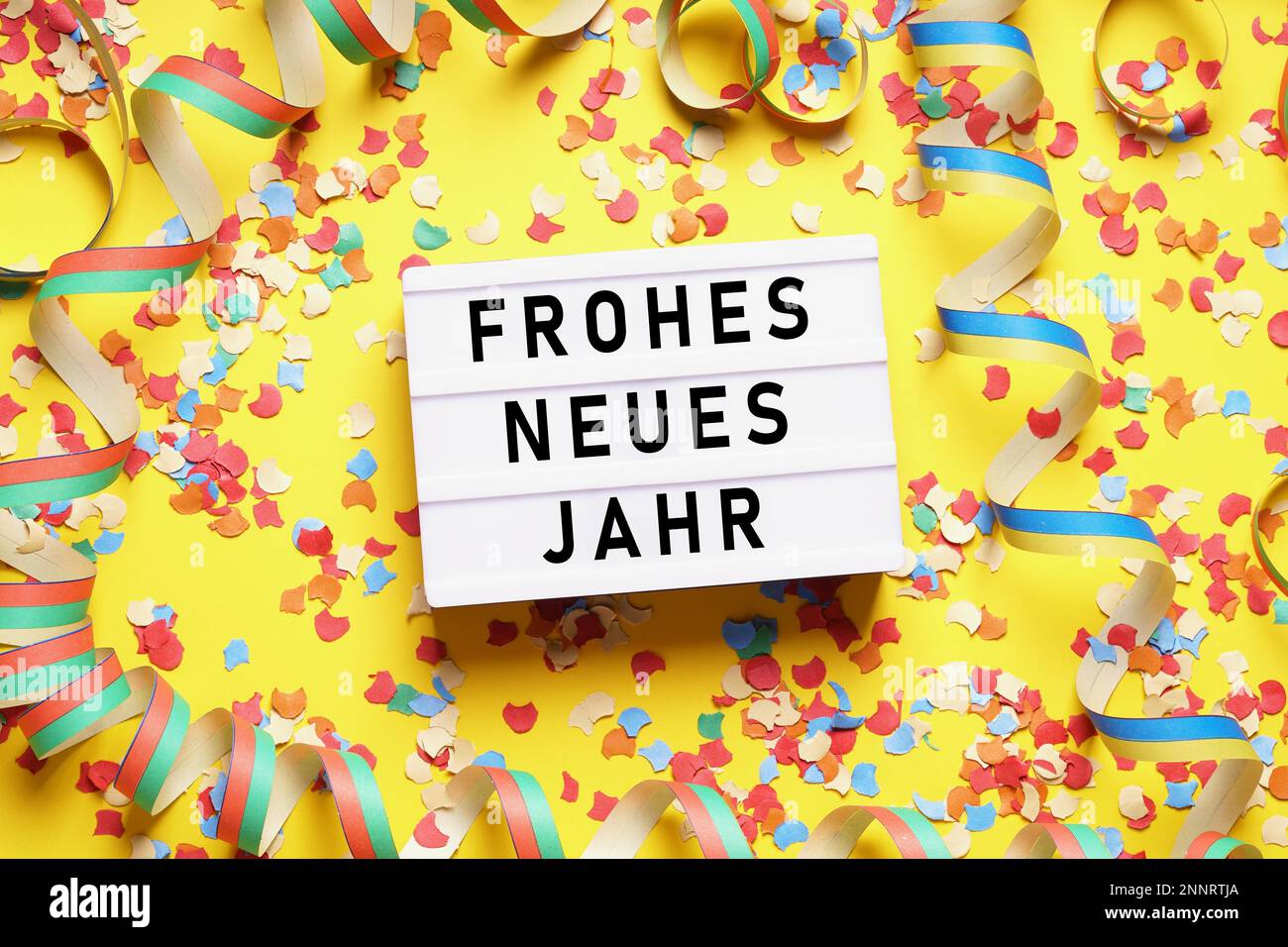 Frohes neues Jahr means happy new year in German - party celebration ...