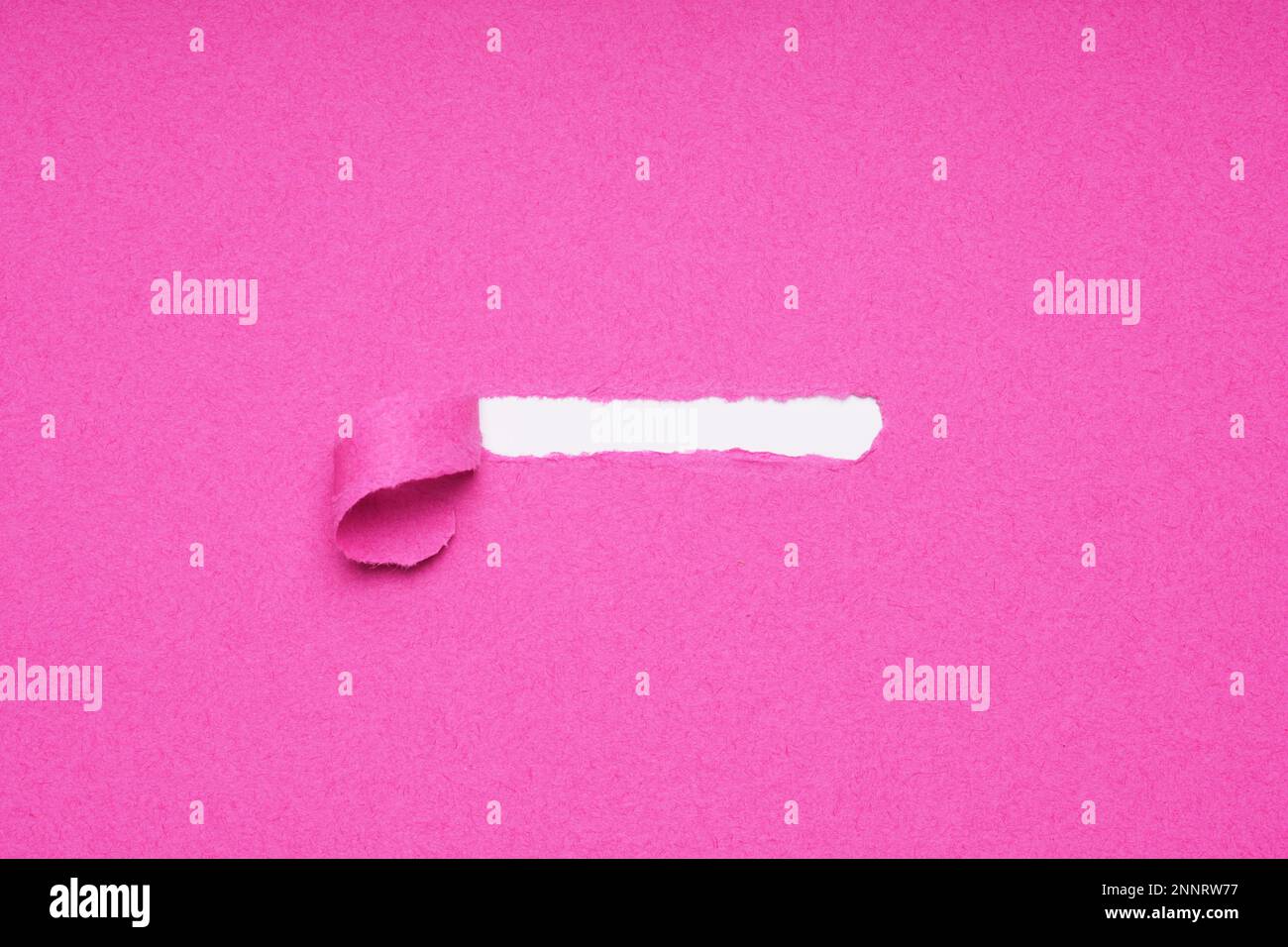 peel away pink torn paper shred to reveal hidden copy space underneath ...