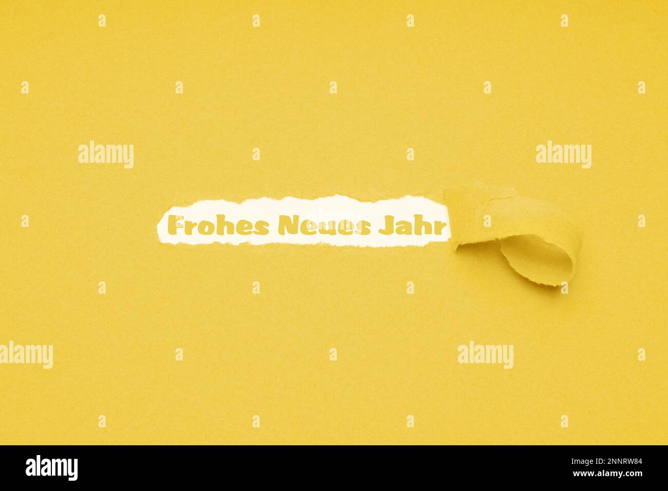 Frohes neues Jahr means happy new year in German - text seen through ...