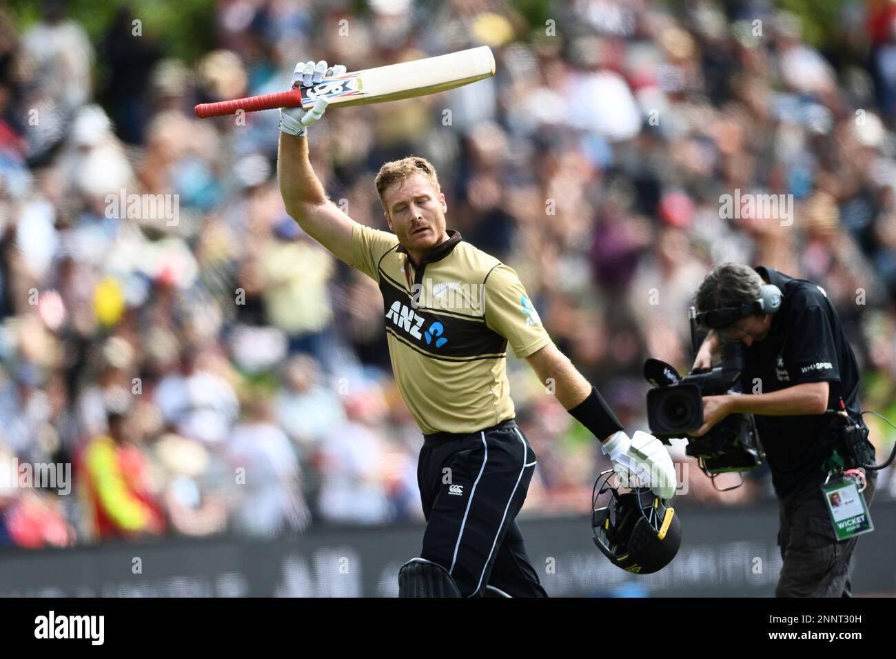 New Zealand batsman Martin Guptill waves tot the crowd as he leaves the ...