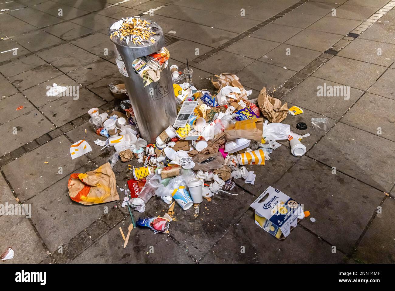 Full waste bins with packaging waste and cigarette butts, Stuttgart ...