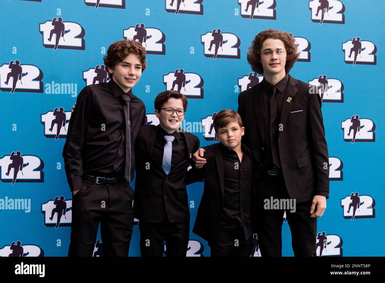 Patrick Marleau's sons, from left to right, Brody, Jagger, Caleb and Landon pose for photos at ...