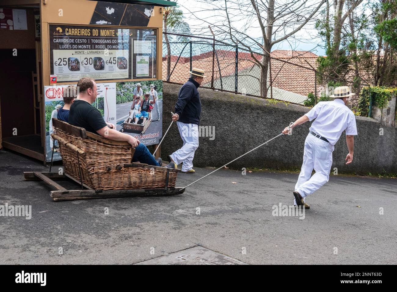 Basket sledge driver, Monte, Madeira, Portugal Stock Photo - Alamy