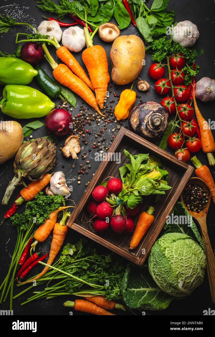 Radish and carrot fresh bunch in old wooden box and fresh farm organic ...