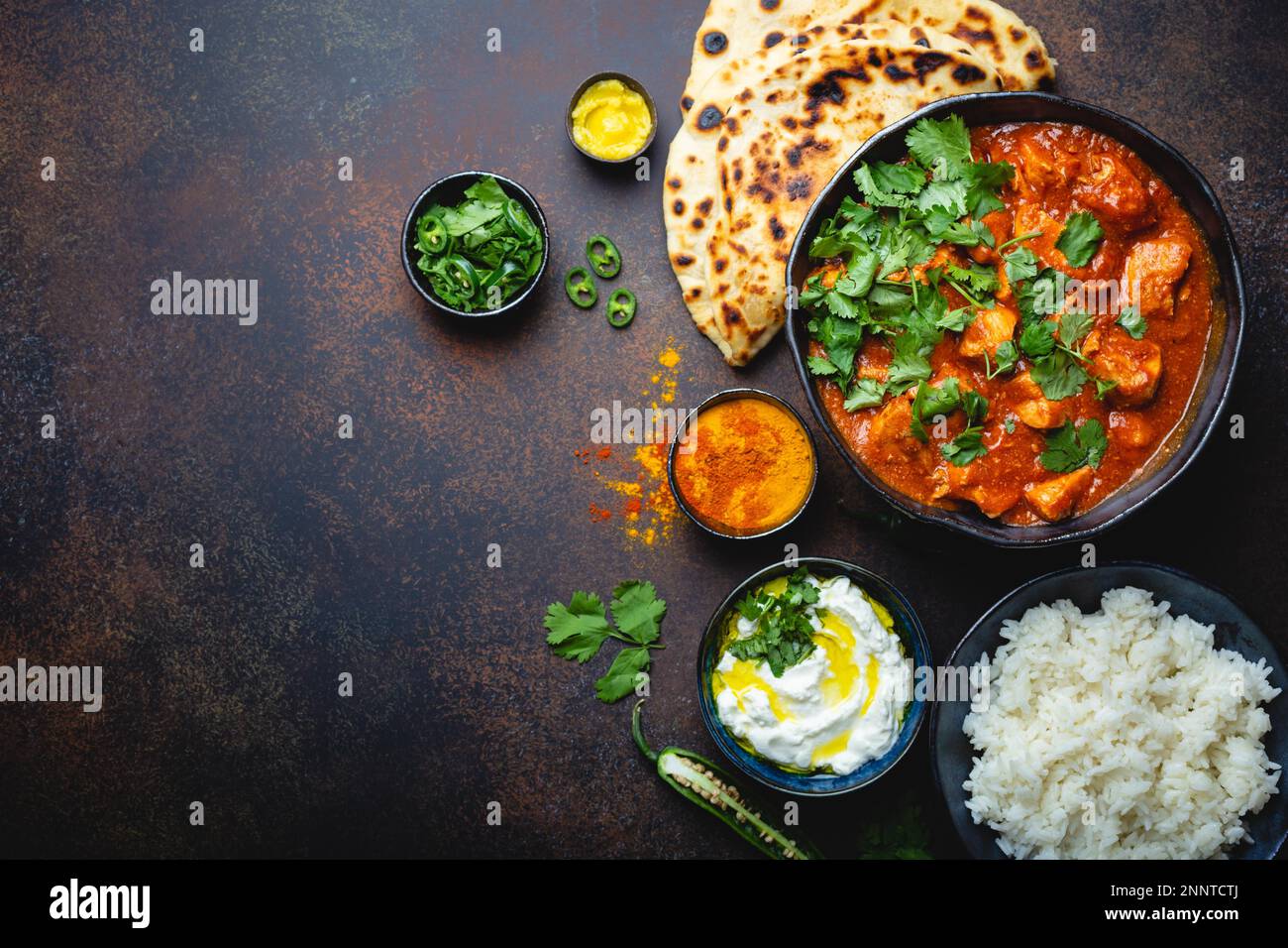 Traditional Indian dish Chicken tikka masala with space for text. Spicy ...