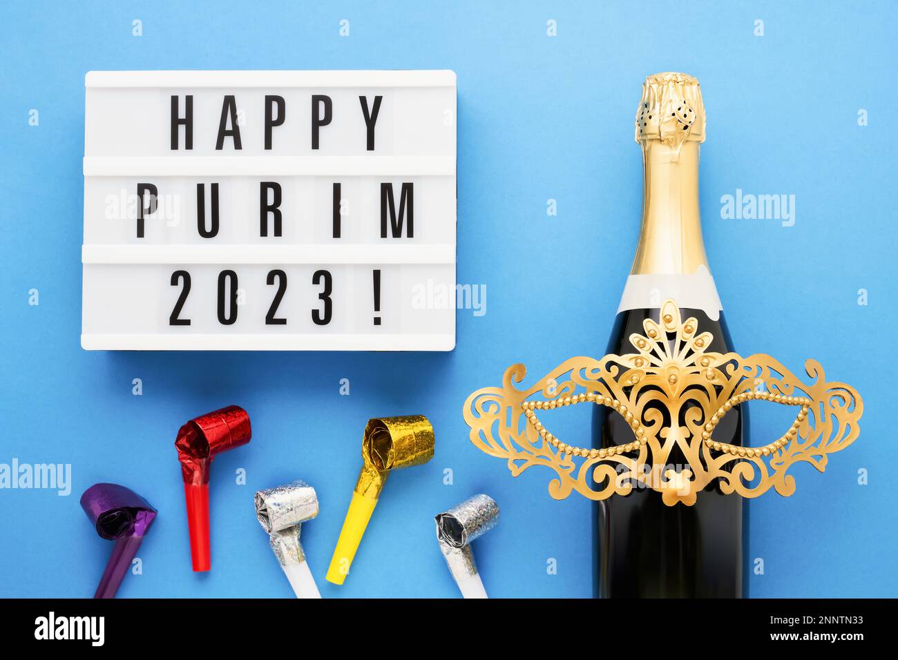 Purim background. Happy Purim 2023 written in lightbox, party props ...