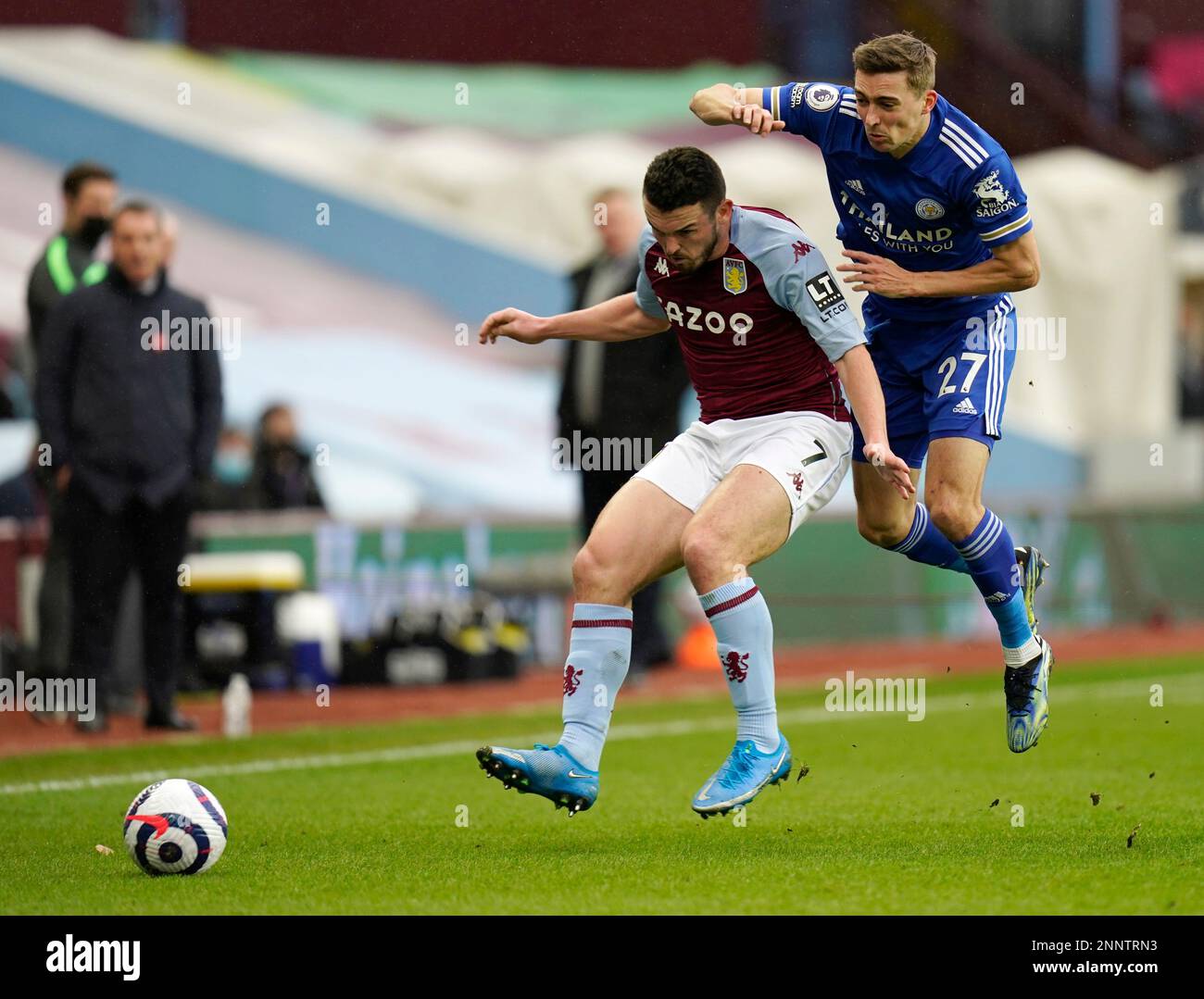 Leicester's Timothy Castagne, right, challenges Aston Villa's John ...