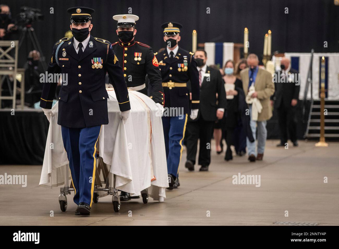 The family of Congressman Ron Wright follow his casket at the end of ...