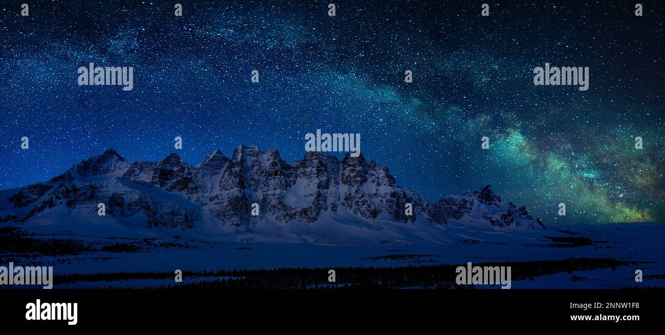 Milky Way over The Ramparts mountain range at night, Tonquin Valley ...