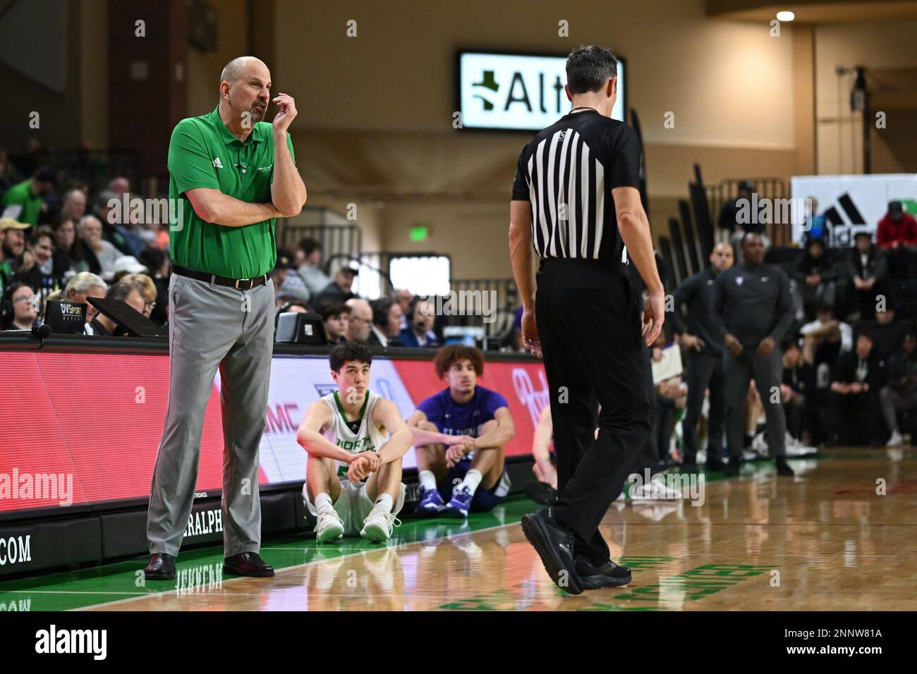 North Dakota Fighting Hawks head coach Paul Sather calls out to an ...