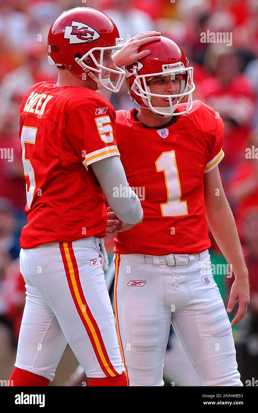 The Kansas City Chiefs' Steve Cheek (5) and Lawrence Tynes (1 ...