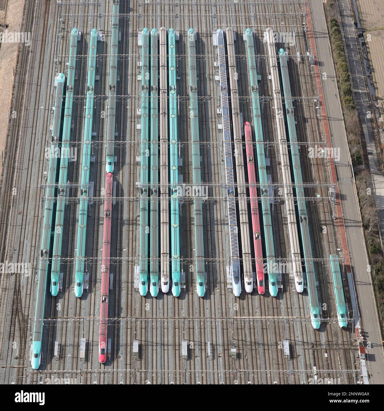 An aerial shows Shinkansen bullet trains lined at the JR East ...