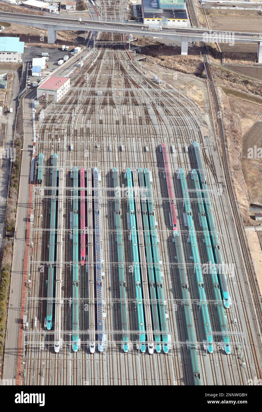 An aerial shows Shinkansen bullet trains lined at the JR East ...