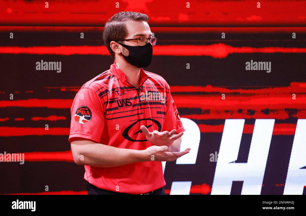 Chris Via claps after rolling a perfect 300 game in the East Regional ...