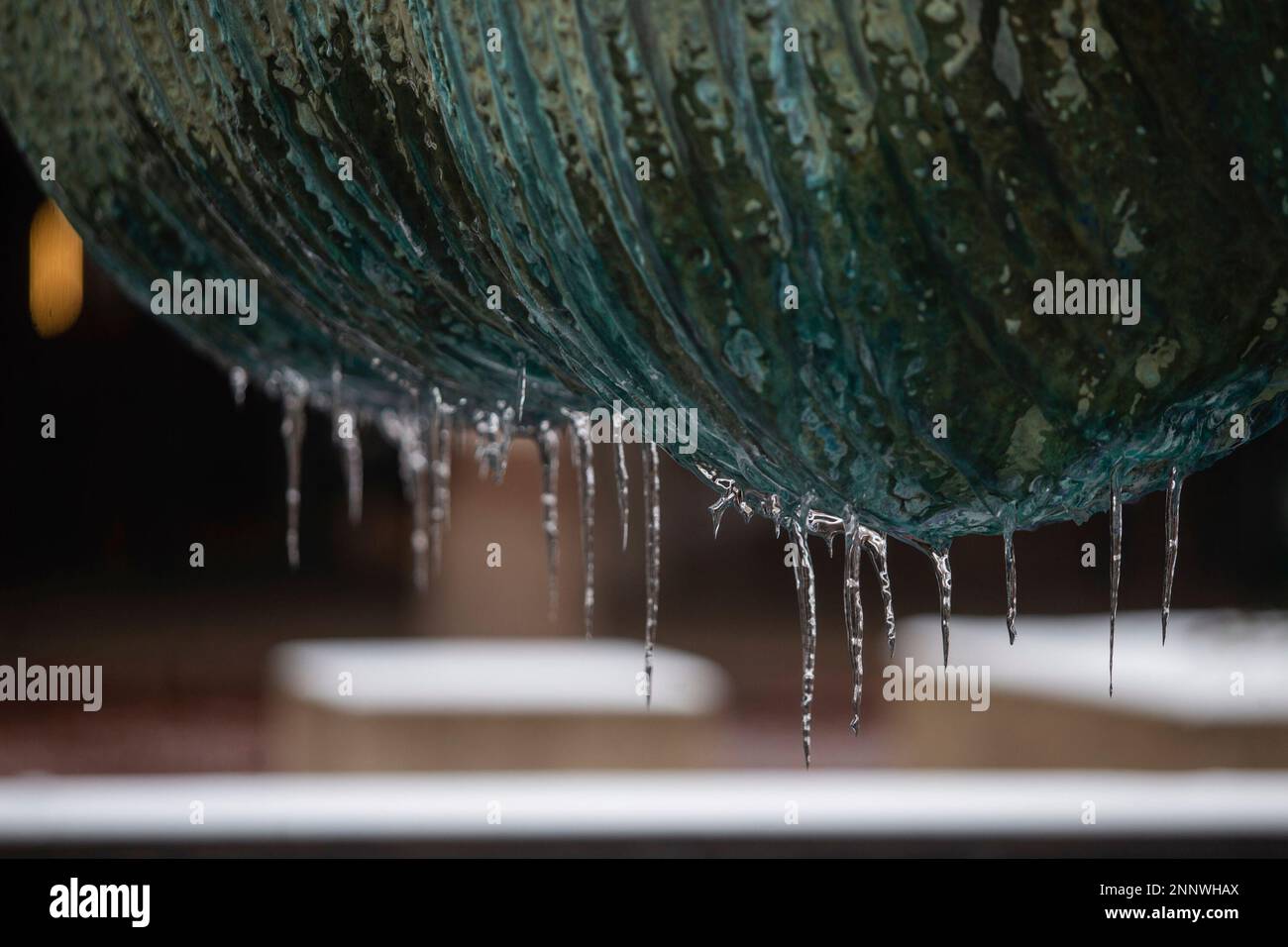 Icicles cling to the Marshall University Memorial Fountain after a ...