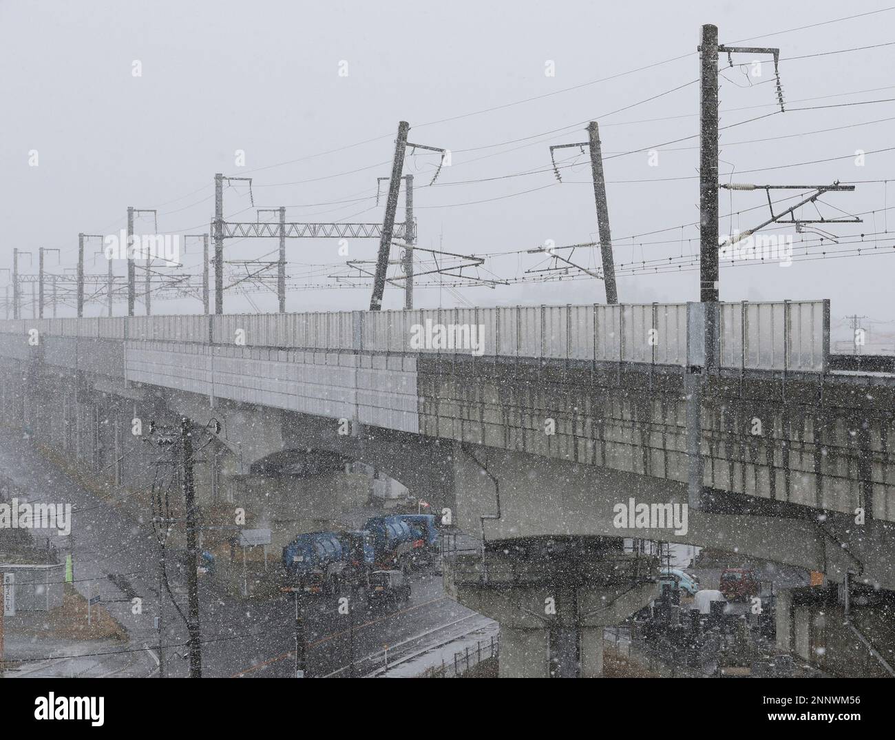 Power poles for the Tohoku Shinkansen Bullet Train damaged sue to a ...