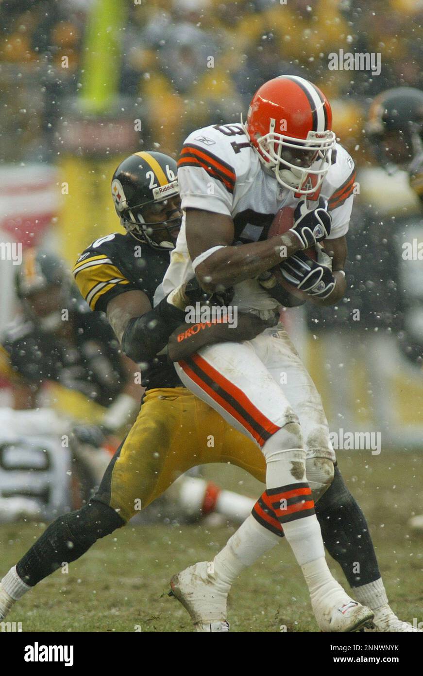 5 Jan 2003: Quincy Morgan of the Cleveland Browns is brought down by ...