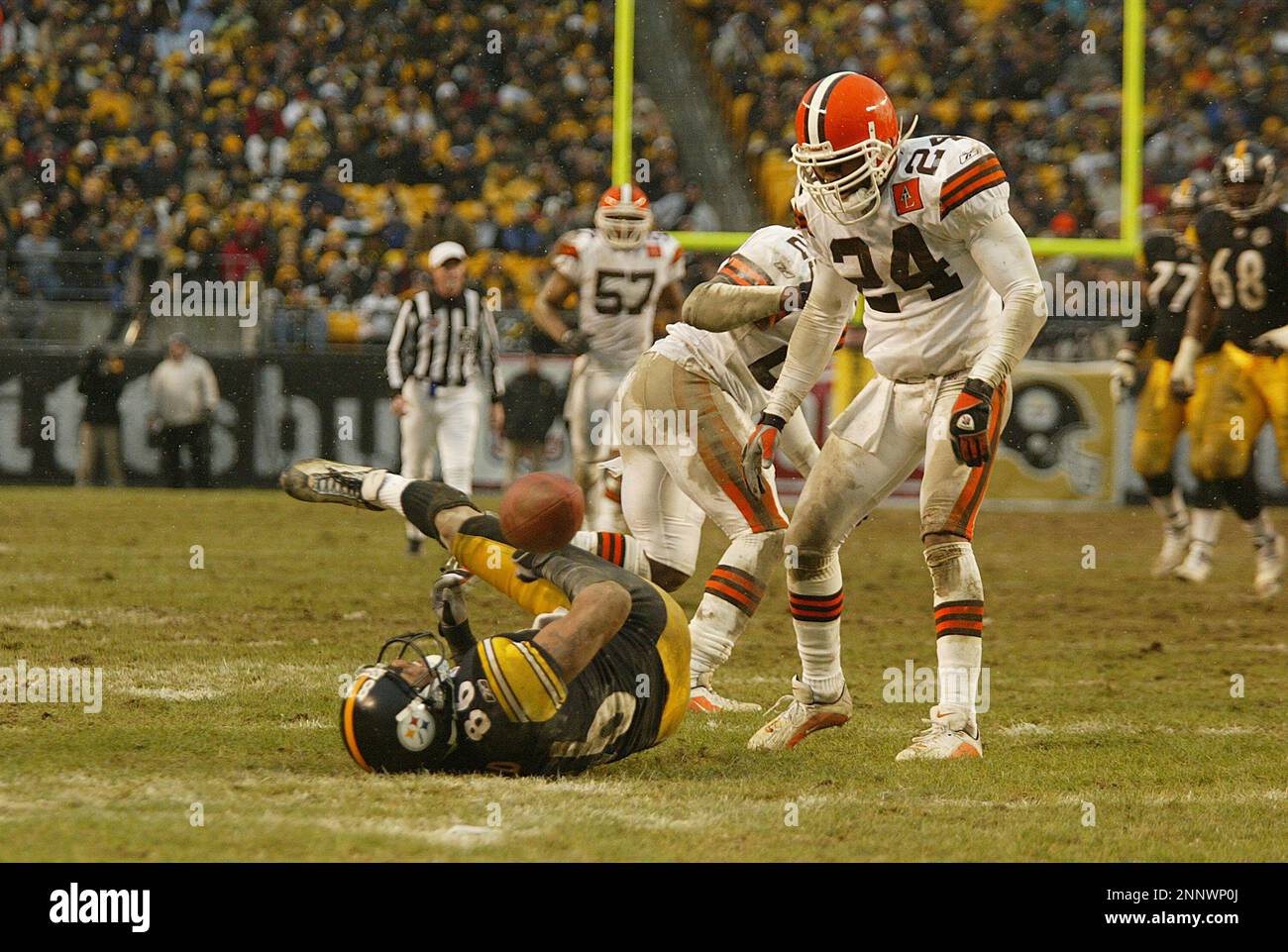 5 Jan 2003: Robert Griffith of the Cleveland Browns hits Hines Ward of ...