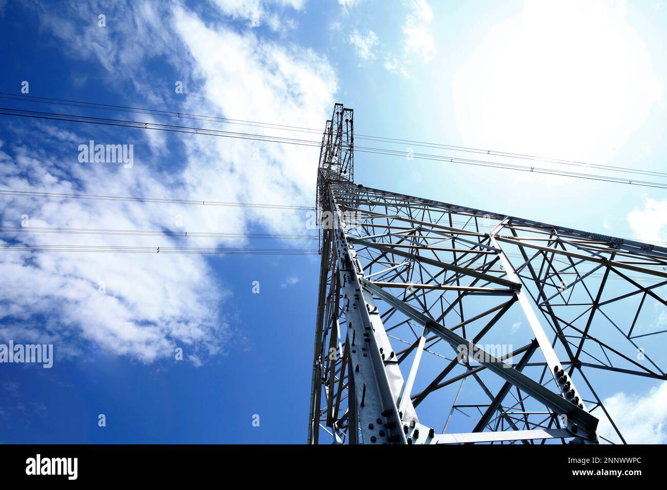 High voltage electric tower line Stock Photo - Alamy