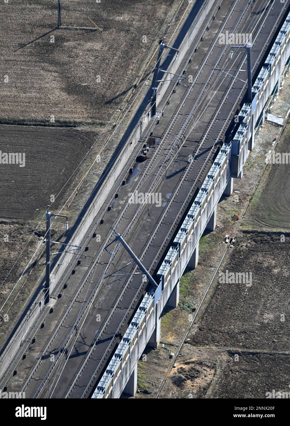 An aerial photo shows overhead electric line of Tohoku Shinkansen ...