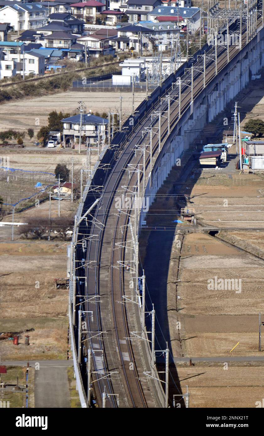 An aerial photo shows overhead electric line of Tohoku Shinkansen ...