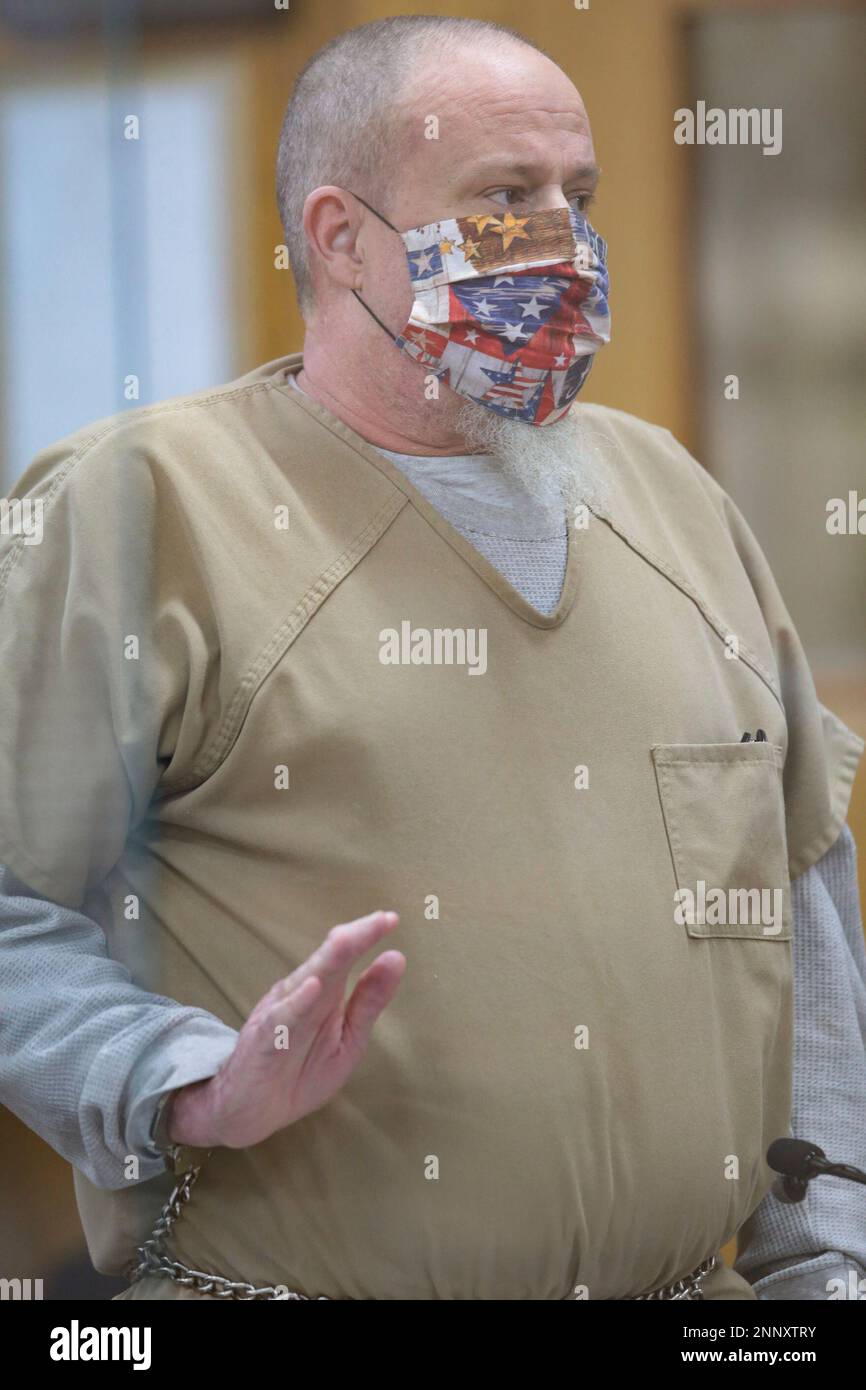 Brian Dripps is sworn in during his plea hearing at Bonneville County ...