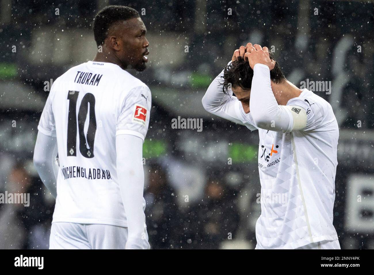 Gladbach's Lars Stindl, right, and Marcus Thuram react disappointed ...