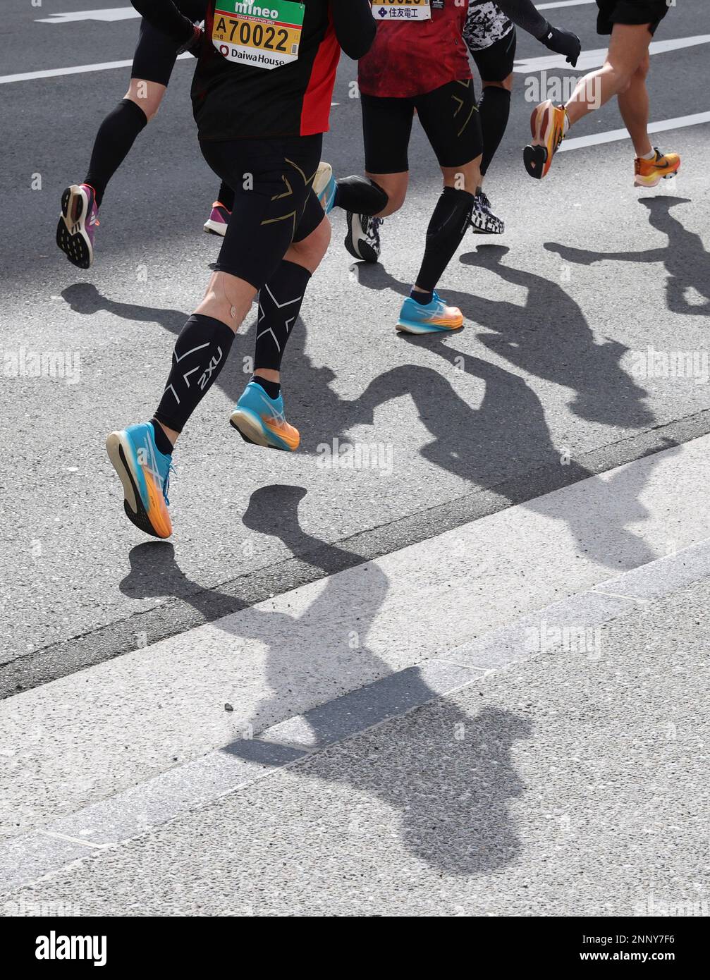 Runners compete during the Osaka Marathon 2023 in Osaka on Feb. 26 ...