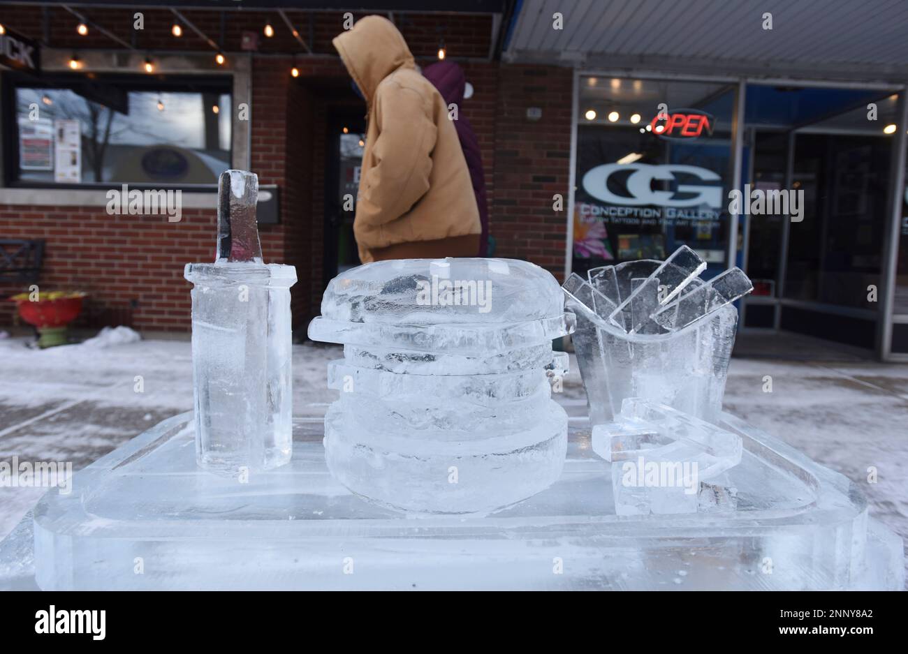 Ice carvers show off their work during the start of The 2021 Magical Ice Fest, Friday, Feb. 5 ...