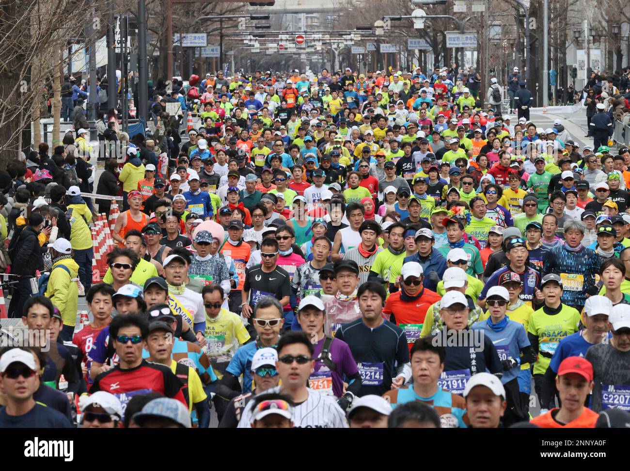 Runners compete during the Osaka Marathon 2023 in Osaka on Feb. 26 ...