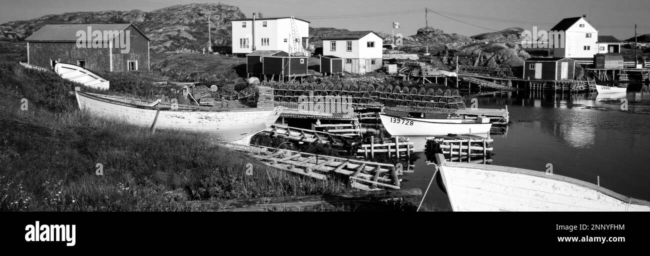 Fishing boats and lobster traps on dock, Change Islands Harbor ...
