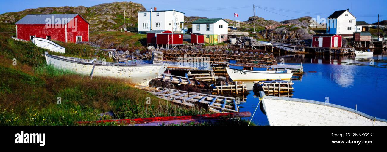 Fishing boats and lobster traps on dock, Change Islands Harbor ...