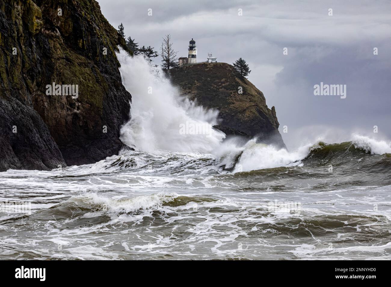 WA23084-00...WASHINGTON - Energettic waves smashing the cliffs during a ...