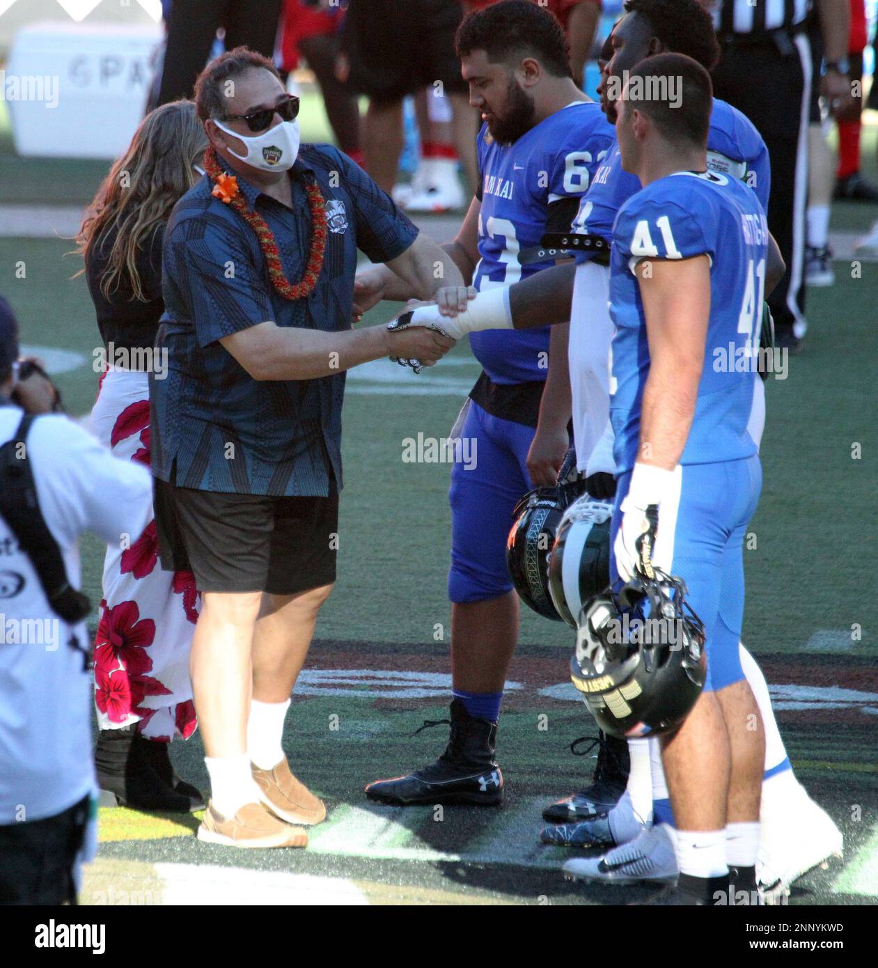 January 31, 2021 - Hula Bowl owner Nick Logan shakes hands during to ...
