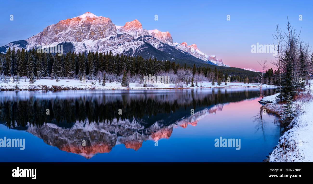 Mount Rundle reflected in Quarry Lake in winter, Canmore, Alberta ...