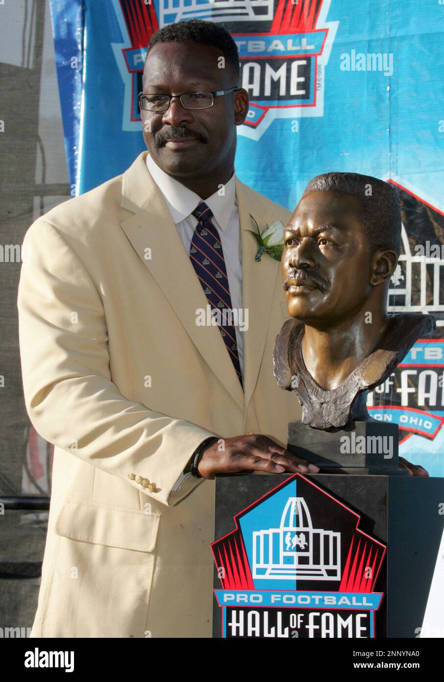 2 AUG 2008: New Hall of Famer Andre Tippett poses with his bust after ...