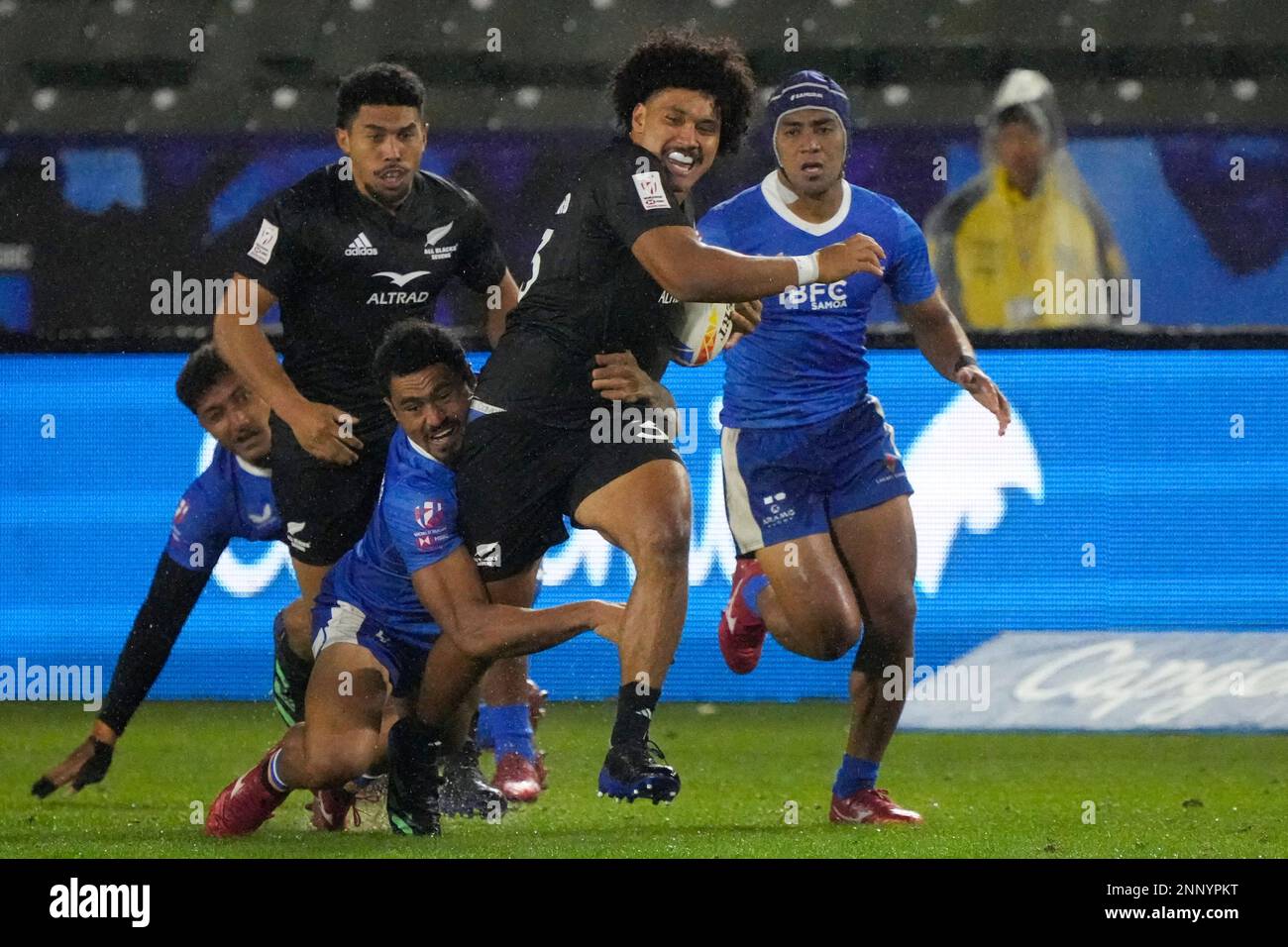 New Zealand's Fehi Fineanganofo is tackled during a World Rugby Sevens ...