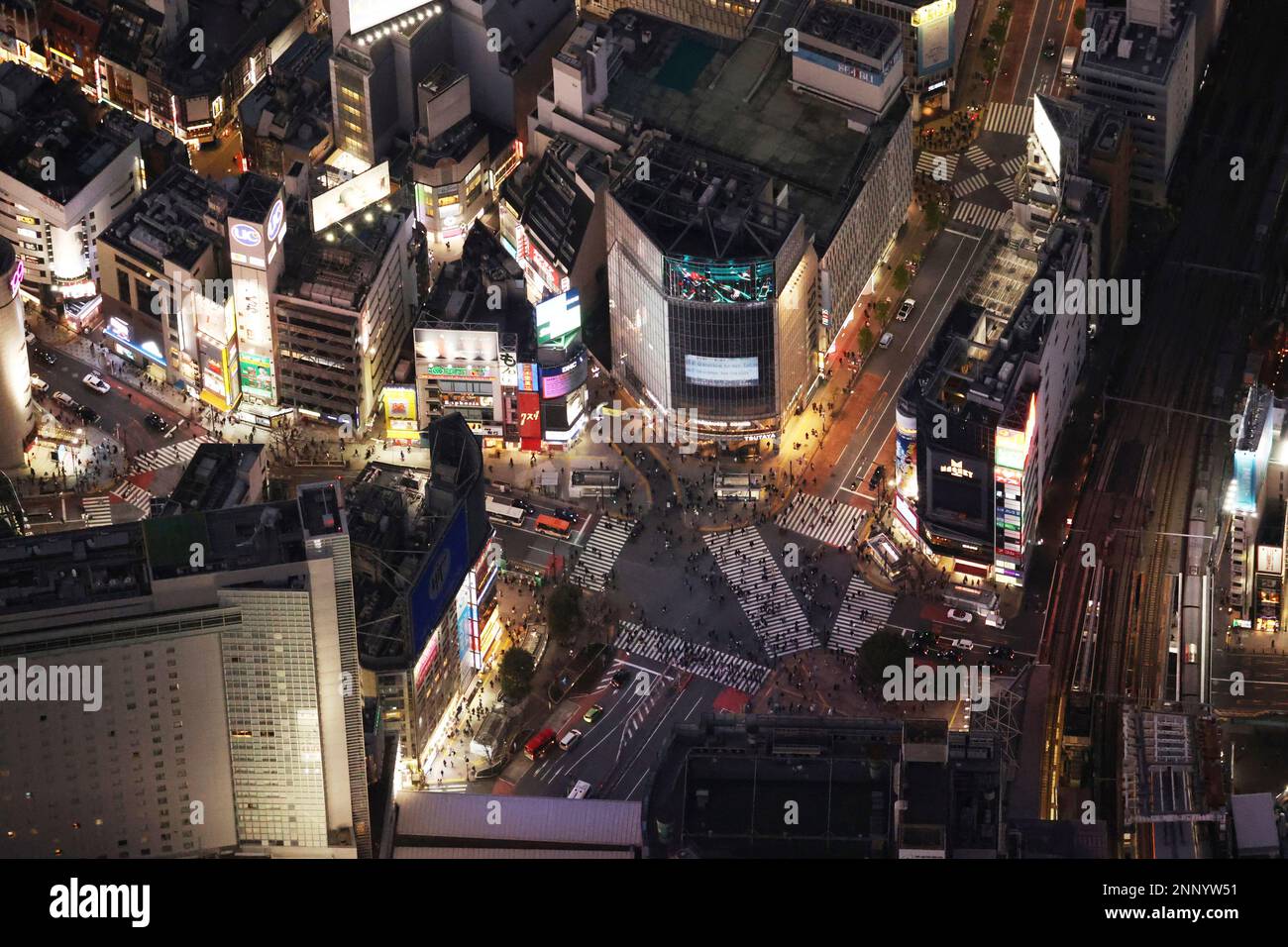 An aerial photo shows a night site of Shibuya Scramble Crossing in ...